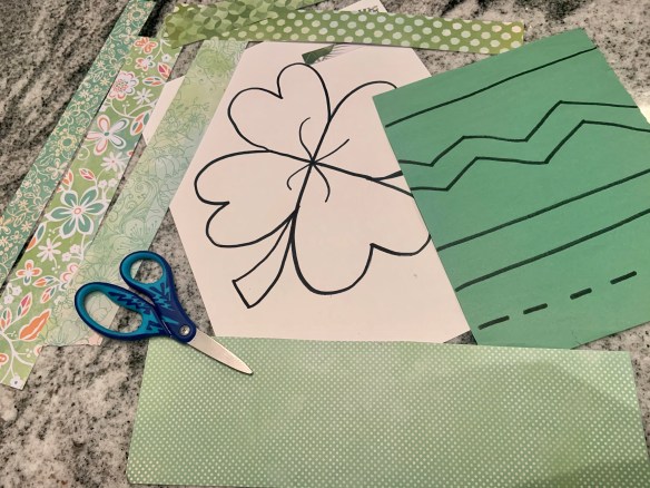 Toddler Activity: Snipped Paper Shamrock Collage | Grey Skies & Rainbow ...